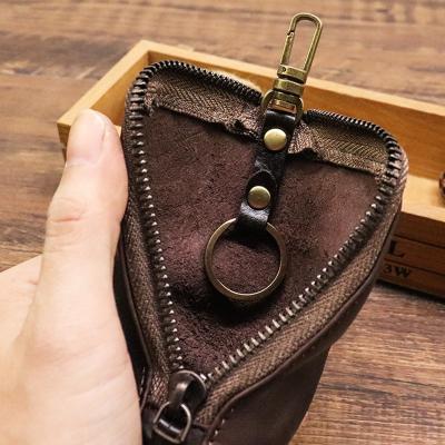 China Chaveira de couro de vaca Vintage Moeda de bolsa para mulheres Homens Vantagem-Low MOQ Mix Modelos à venda
