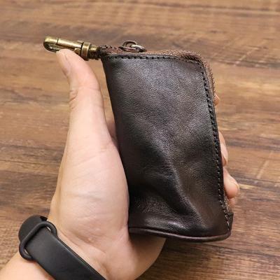 China Chaveira de couro de vaca Vintage Moeda de bolsa para mulheres Homens Vantagem-Low MOQ Mix Modelos à venda