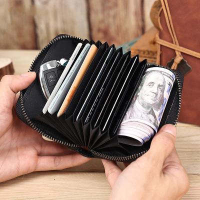 Cina Borsa da moneta unisex con grande capacità e chiusura a cerniera RFID in pelle in vendita