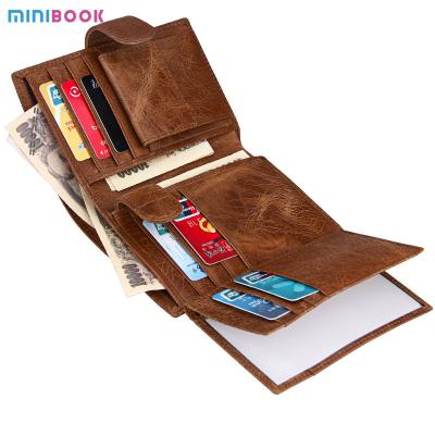 Cina Portafoglio in pelle di mucca da uomo con logo personalizzato, blocco RFID e clip monetario in design vintage in vendita