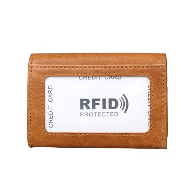 Cina 2024 Portafoglio a cerniera bifold corto per uomini Logo personalizzato e blocco RFID in pelle di mucca in vendita