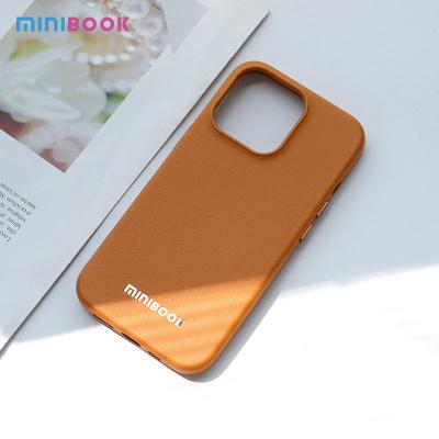 Cina Personalizza Logo in rilievo Refrazione a prova di urti Ricarica wireless Magnetico Pu cuoio custodia per telefono Per Iphone 13 14 Pro Max in vendita