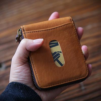 Cina Portafogli di moda da uomo corto e con cerniera fatta a mano con cuoio di mucca retrò in primo strato in vendita