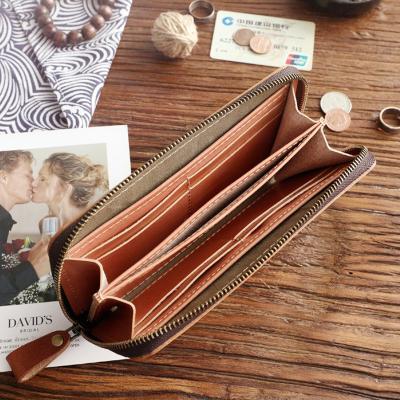 Cina Portafoglio in pelle d'uomo in pelle originale con grande capacità e chiusura a cerniera in vendita