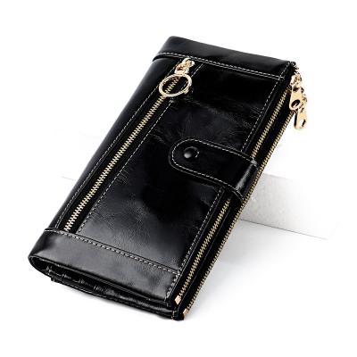 Cina La vita quotidiana Essential RFID Anti-furto spazzola Portafoglio lungo con un'imbracatura per monete per cellulari in vendita