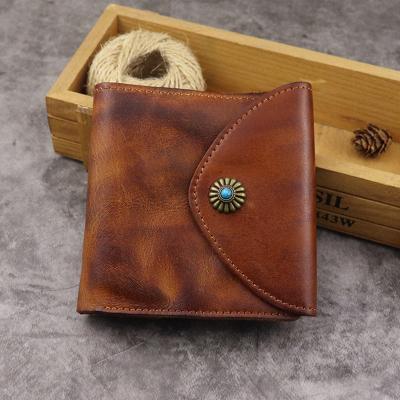 China Carteira masculina de pele bronzeada vegetal de primeira camada de três dobras estilo japonês e na moda à venda