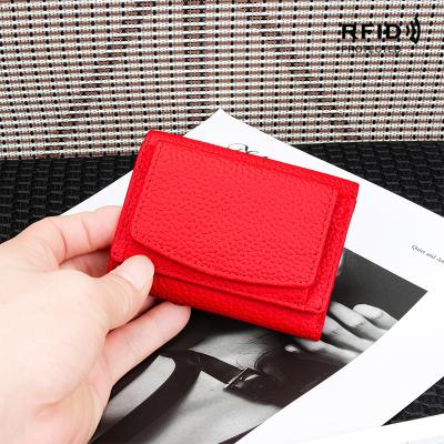 Cina Portafoglio da donna di moda corta con slot multi-carte di grande capacità e design anti-furto in vendita