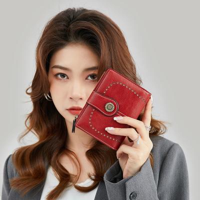 Cina Portafoglio in pelle femminile a blocco RFID con piccolo disegno bifold e opzione di logo personalizzato in vendita