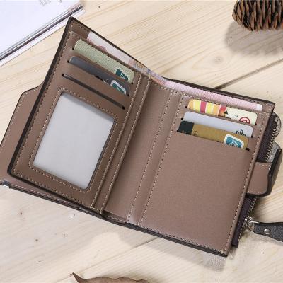 Cina Portafoglio corto con zip e design anti-furto. in vendita