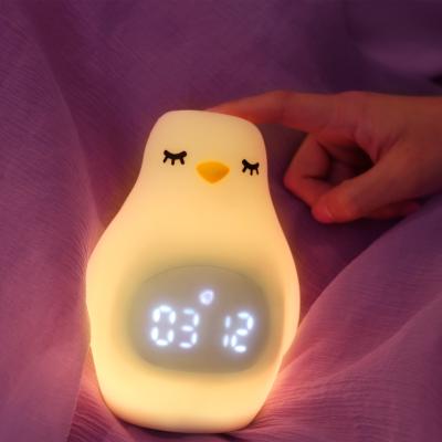 Cina Pinguino Alarme da tavolo elettronico orologio bambini camera da letto Silicone luce notturna bambini sleep trainer in vendita