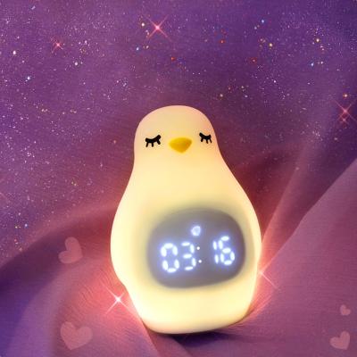 Cina Pinguino Alarme da tavolo elettronico orologio bambini camera da letto Silicone luce notturna bambini sleep trainer in vendita