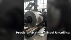 Uncoiling stainless‑steel coils in progress