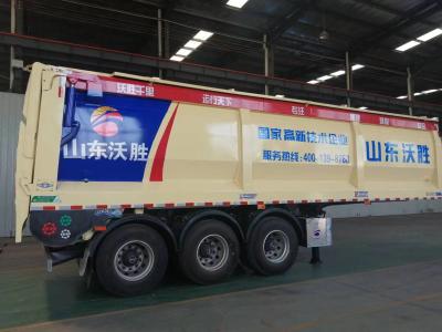 China Rear Dump Semi Trailer with Automatic Crawler Belt Discharge and Max Payload 30-60ton for sale