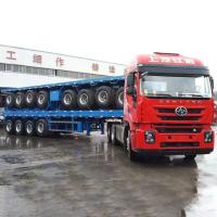 China Multifunctional Flat Transfer Container Flatbed Semi Trailer with Triangle Tire Specs for sale
