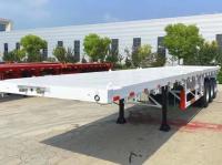 China Max Payload 50tons 3 Axle 40ft Container Semi Trailer Chassis Flat Bed Flatbed Trailer for sale