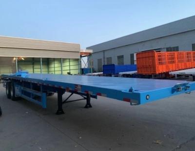 China 12.00R22.5 Tire 60 Tons 80 Tons Payload Flatbed Semi Trailer for Container Transport for sale