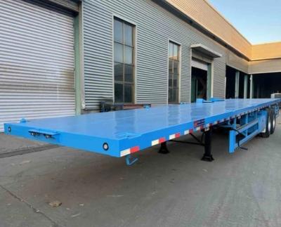 China 12.00R22.5 Tire 60 Tons 80 Tons Payload Flatbed Semi Trailer for Container Transport for sale