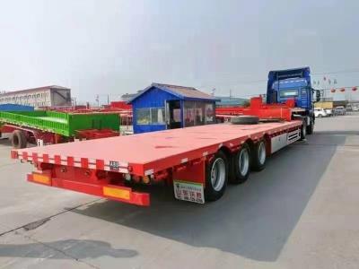 Cina Vendita diretta Semi-remorco a letto piatto personalizzato 2/3 asse 20FT 40FT Contenitore direttamente in vendita