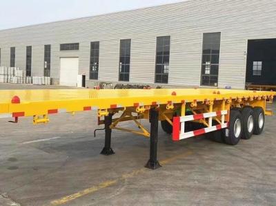 China Max Payload 50tons Hydraulic Lift Flatbed Semi Trailer with Twist Lock and Double Axle for sale
