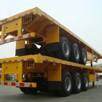 中国 13トン*3軸 20FT 40FT コンテナを輸送するための重用平床半トレーラー 販売のため
