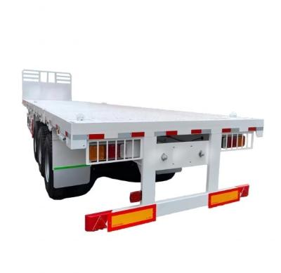 China 90T Max Payload Steel 20FT 40FT Container Flatbed Semi-Trailer met 12r22.5 band Te koop