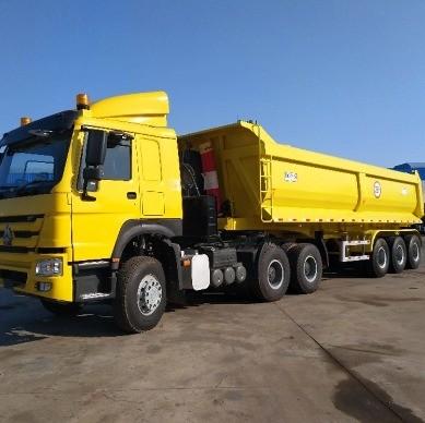 Cina 30-100 tonnellate di rimorchio a gomma con forma a U e funzione di trasporto di grano con pietra di sabbia in vendita