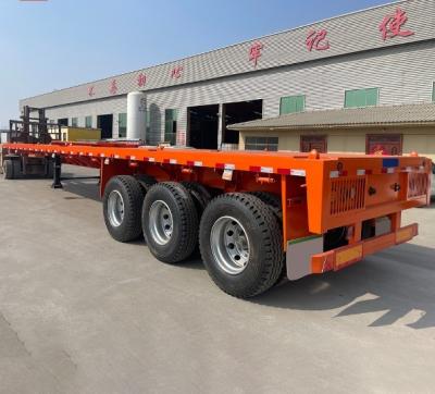 Cina Capacità di carico di 55 tonnellate Container Semi-remorco a letto piatto 3 assi 4 assi Personalizzazione in vendita