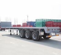 China 55 Tons Loading Capacity Container Flatbed Semi Trailer 3 Axle 4 Axle Customization for sale