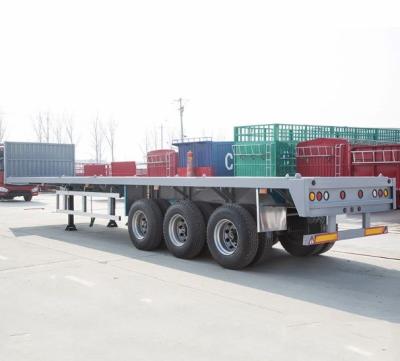 Cina Capacità di carico di 55 tonnellate Container Semi-remorco a letto piatto 3 assi 4 assi Personalizzazione in vendita