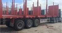 China 80T Flatbed Timber or Log Loader Semi Trailer with Side Columns Mechanical Suspension for sale