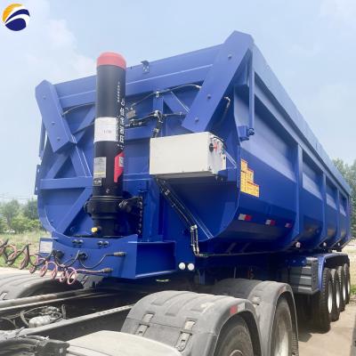 China Semi-remolque de 4 eixos hidráulico traseiro para transporte de grãos de areia à venda