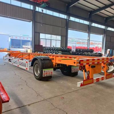 China Carga útil máxima 30000 kg Container de 20 pés e 40 pés Chassis Skeleton Truck Semi-trailer à venda