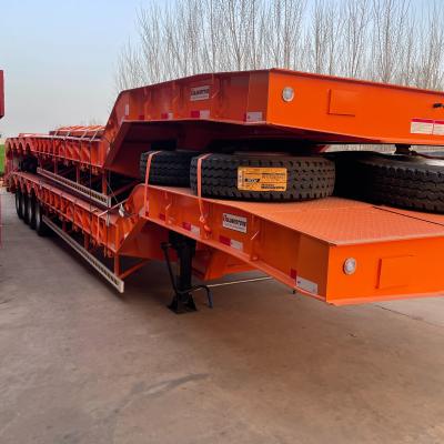 Китай Полуприцеп с высокой пропускной способностью 60-120 тонн с низким ложем с хорошей пропускной способностью 3-5 осей продается