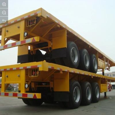 China Tare Weight 7.0 Ton 3 Axle 4 Axle Capacity 50-80Tons Flat Bed Semi Trailer for Truck for sale