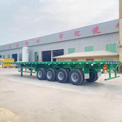 China 3 assen 20FT 40FT Container Chassis Flat Bed Semi Truck Trailer met staalmateriaal Te koop