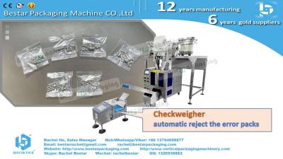 China Screw nails counting packaging machine with warning light for sale