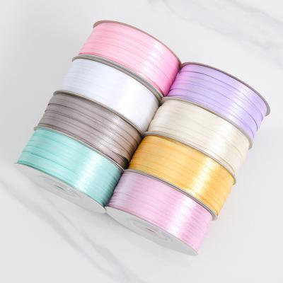 China 3 mm de color variado estrecho de alta durabilidad de poliéster de cinta de satén personalizada para el embalaje de regalos en venta