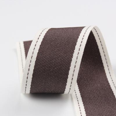 China Cinturón de poliéster de borde cosido de 6 mm a 40 mm, rodillos de cinta de poliéster verde rojo en venta