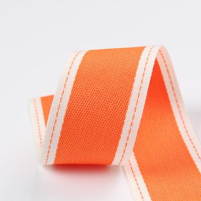 China Cinturón de poliéster de borde cosido de 6 mm a 40 mm, rodillos de cinta de poliéster verde rojo en venta