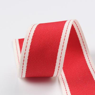 China Cinturón de poliéster de borde cosido de 6 mm a 40 mm, rodillos de cinta de poliéster verde rojo en venta