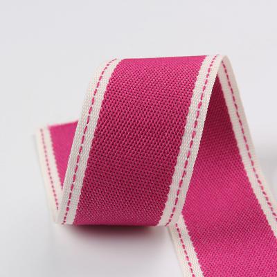 China Cinturón de poliéster de borde cosido de 6 mm a 40 mm, rodillos de cinta de poliéster verde rojo en venta