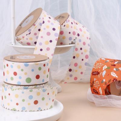 Cina Nastro di poliestere stampato a puntini rotondi da 25 mm a 38 mm Nastro di cotone per Natale in vendita