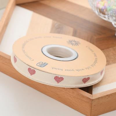 Cina 13mm Logo all'ingrosso Nastro di cotone Stile letterario Imballaggio di fiori Scatola regalo Decorazione Nastro Torta Bouquet in vendita