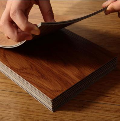 China 2.0MM self-adhesive sheet glue-free PVC plastic floor glue wood grain household commercial waterproof wear for sale