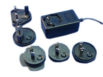 China 12V 1A ac switchng power adapter with interchangeable AC plug EU, AU,UK, USA for sale