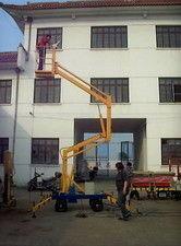 China Mobile Hydraulic Boom Lift Crank Arm Electric Work Platform With Wheels for sale