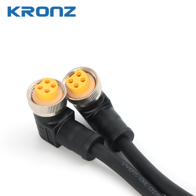 Close-up view of 7/8 inch connector's angled cable outlet and pins