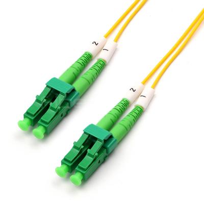 China LC APC To LC UPC Patch Cord Duplex Single Mode OS2 OFNR 1.2mm Yellow for sale