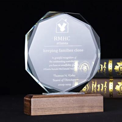 China Customized Engraved Logo K9 Glass Award Elegant Transparent Octagonal Crystal Trophy Award Medal Trophy for sale