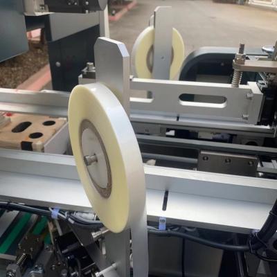 Cina Singola incollatura parteggiata dell'angolo del contenitore di impacchettatrice della colata della cucitura del nastro caldo di plastica della guarnizione in vendita